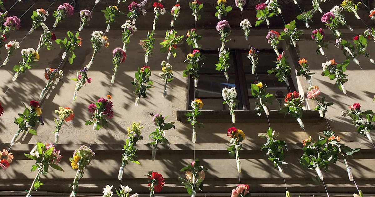 Colorful Curtain of Over 2,000 Flowers Cascades Down a Building’s ...