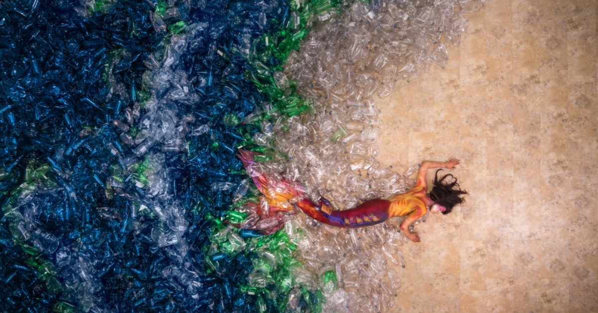 Mermaid Swims in a Sea of 10,000 Bottles to Spotlight Plastic Pollution ...